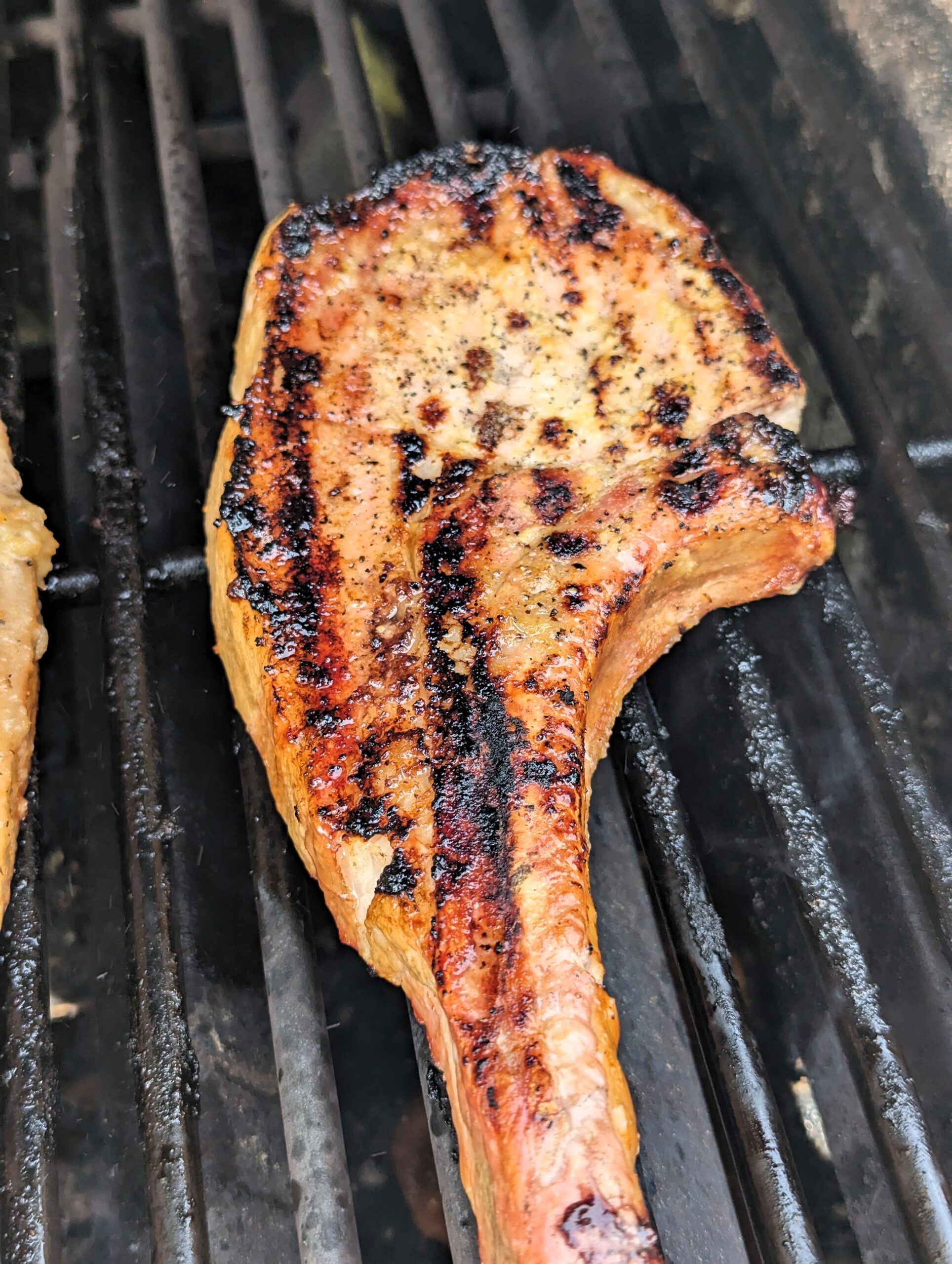Tender Smoked Tomahawk Pork Chops with Habanero Glaze - What's Smoking