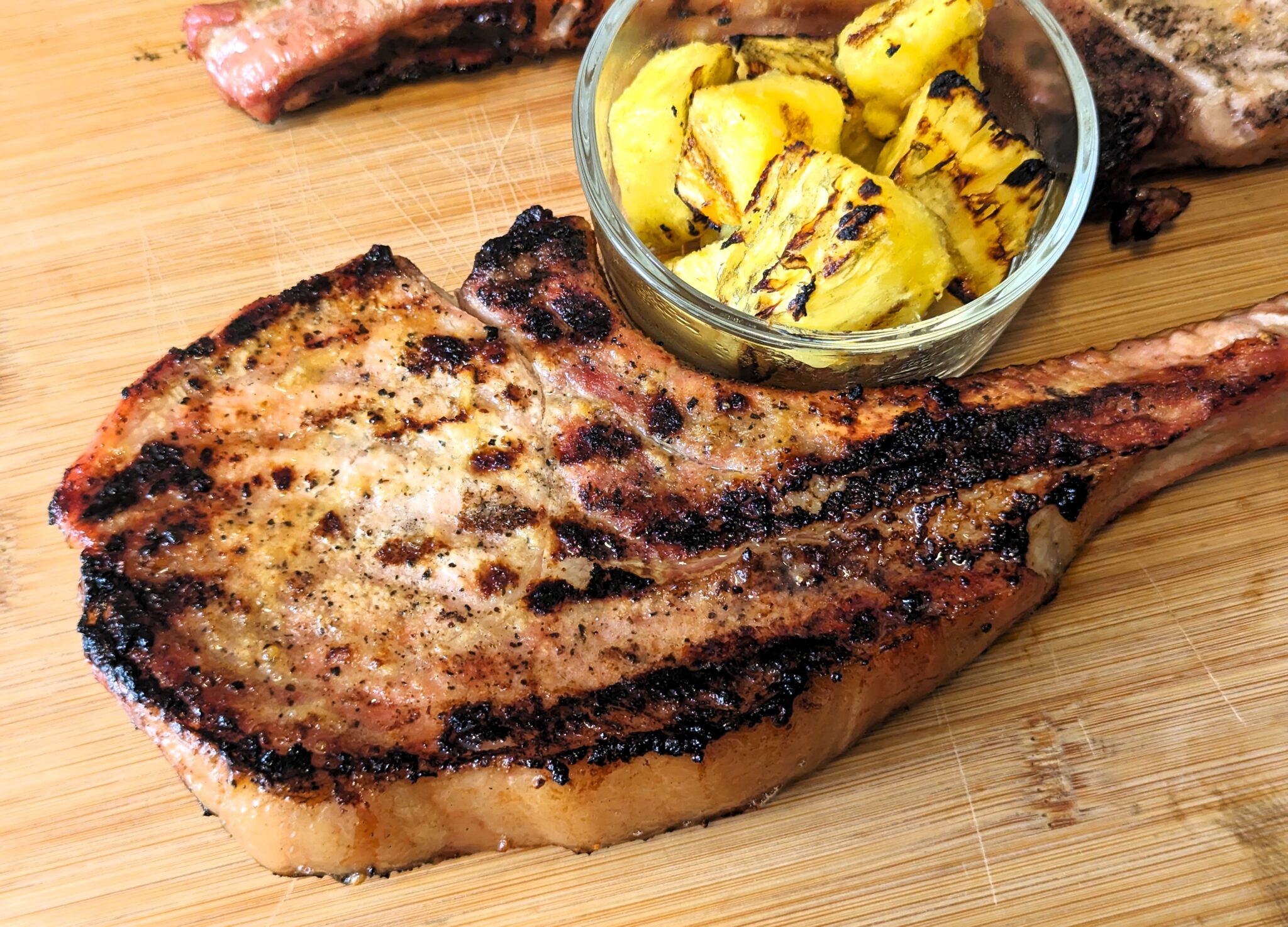 Tender Smoked Tomahawk Pork Chops with Habanero Glaze - What's Smoking